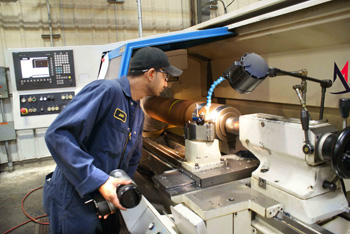 Cycle-Controlled Lathes Put Teeth in Cougar Tool's Oil-Field Equipment Shop